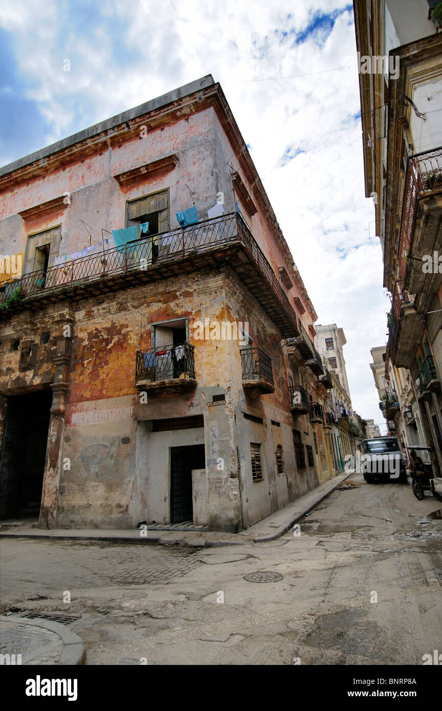 Corner with eroded building facade against blue sky in San ignacio ...