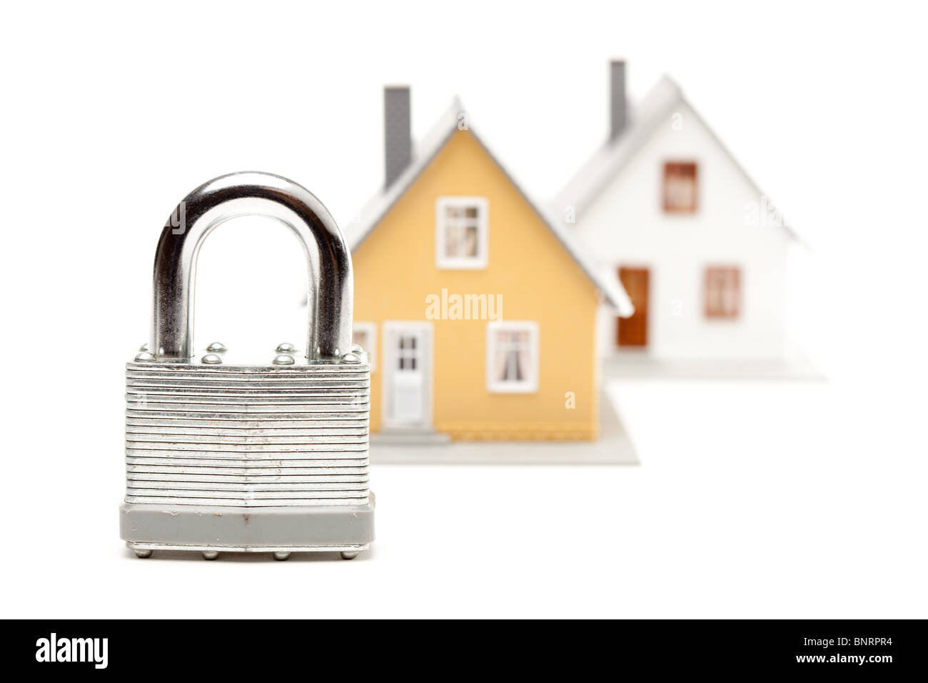 Lock and Houses Isolated on a White Background Stock Photo - Alamy