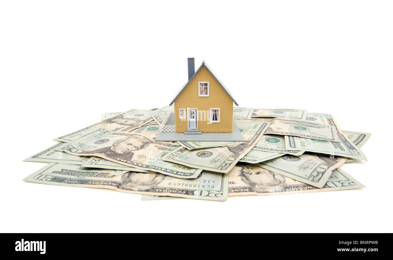 Home and Money Isolated on a White Background Stock Photo - Alamy