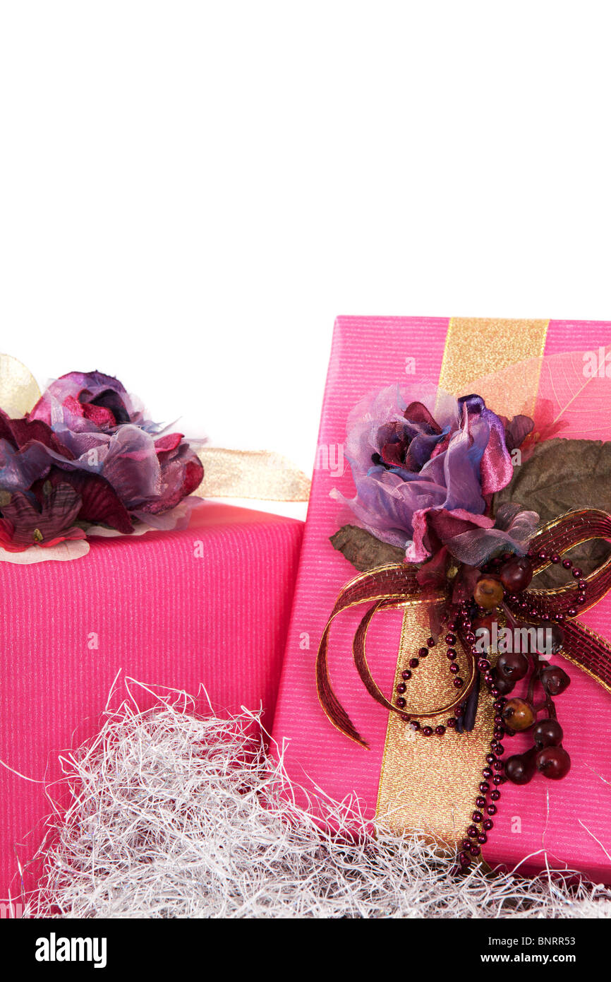 Two presents gift-wrapped in pink, studio shot Stock Photo - Alamy
