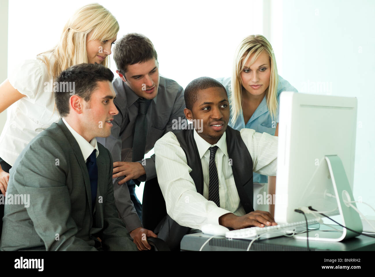 Business team working in office Stock Photo - Alamy