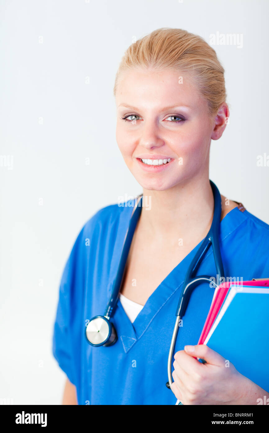 Beautiful nurse holding a folder hi-res stock photography and images ...