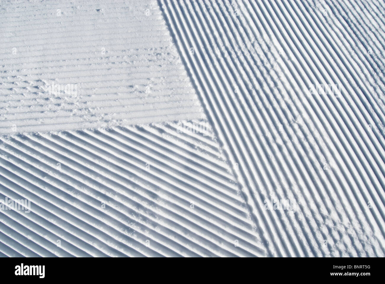 Snow patterns made from a grooming machine line the snow in Truckee ...