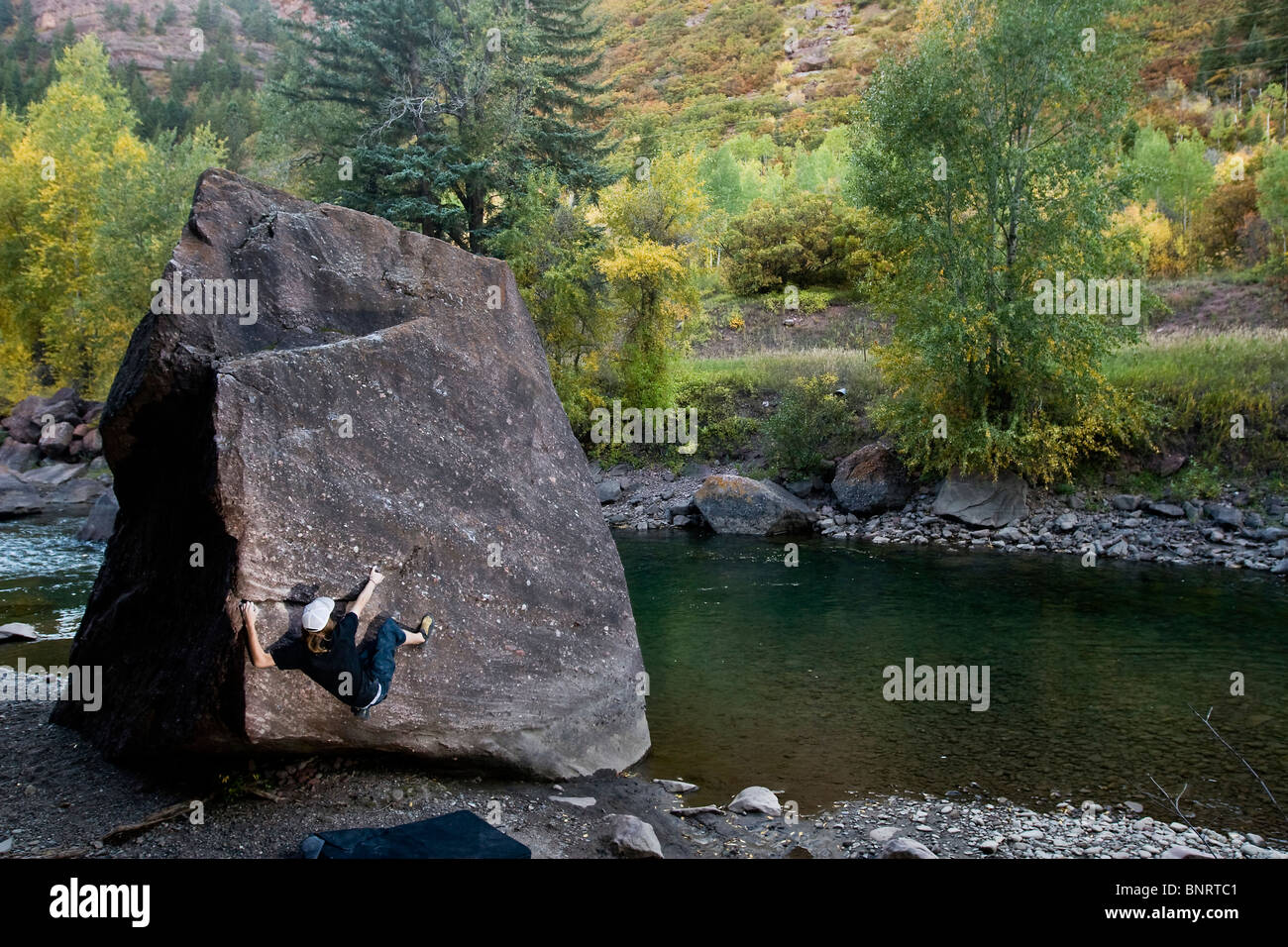 A male rock climber working on a bouldering problem in Colorado Stock ...