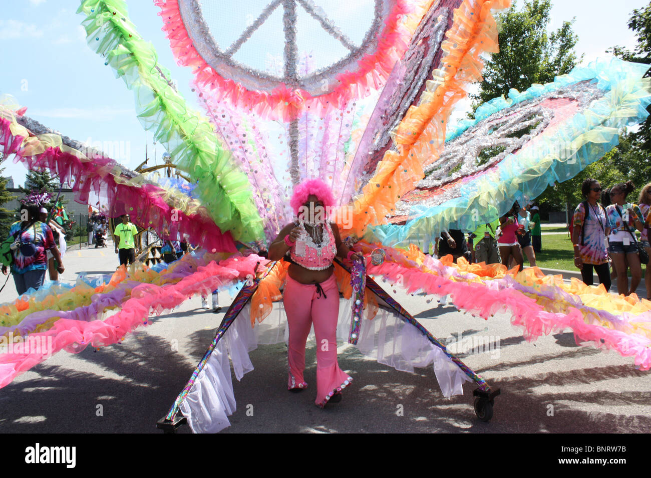 black woman colorful costume celebrate parade Stock Photo - Alamy