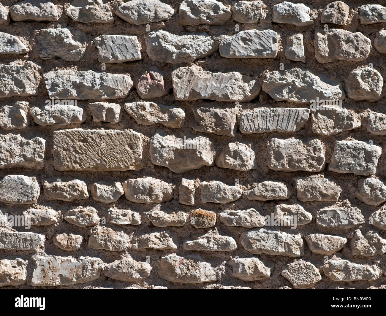 Rough hewn stone wall hi-res stock photography and images - Alamy