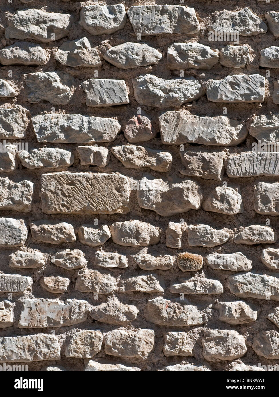 Rough hewn stone wall hi-res stock photography and images - Alamy
