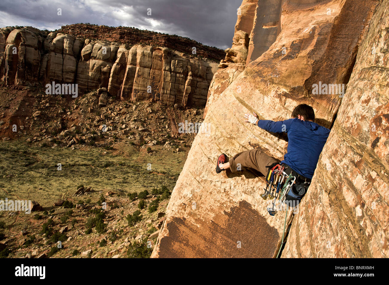 A man climbs at Indian Creek Utah Stock Photo - Alamy
