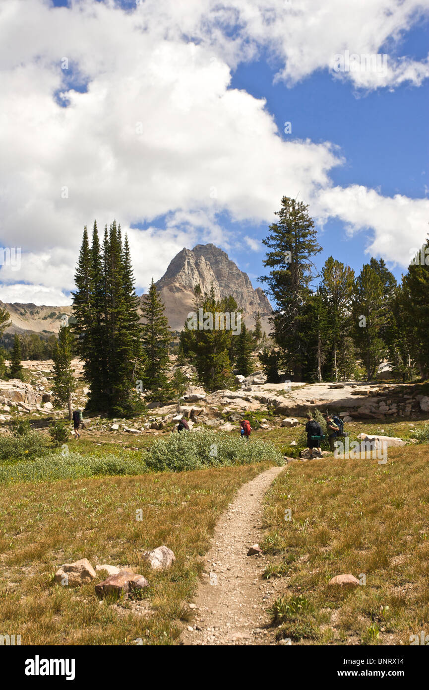 Hikers backpack through Alaska Basin with Buck Mountain in the ...