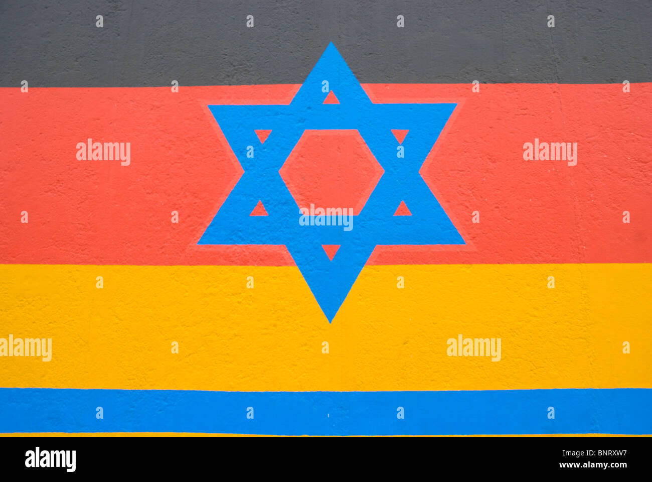 Combined German and Israeli flags at East Side Gallery wall museum ...