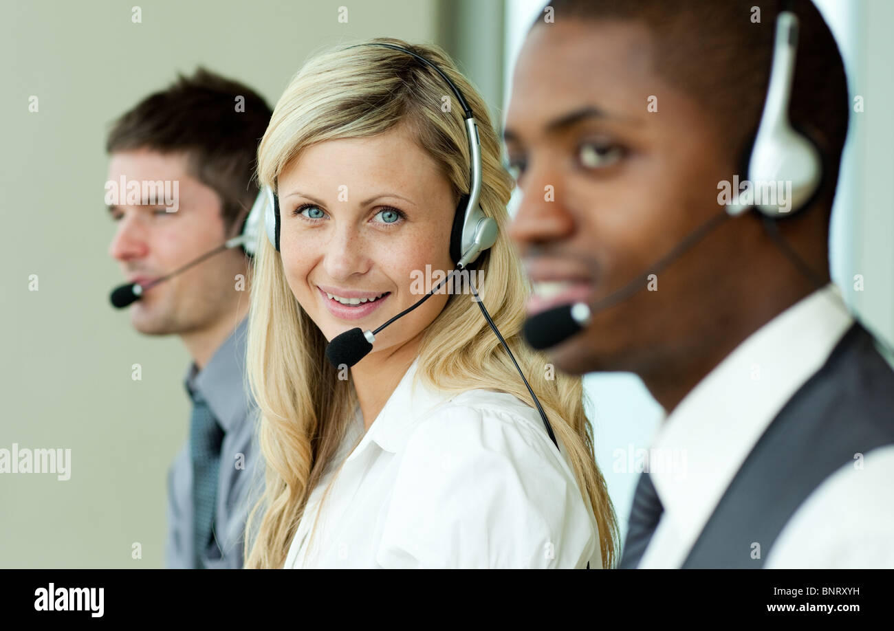 Businesspeople wearing headsets Stock Photo - Alamy