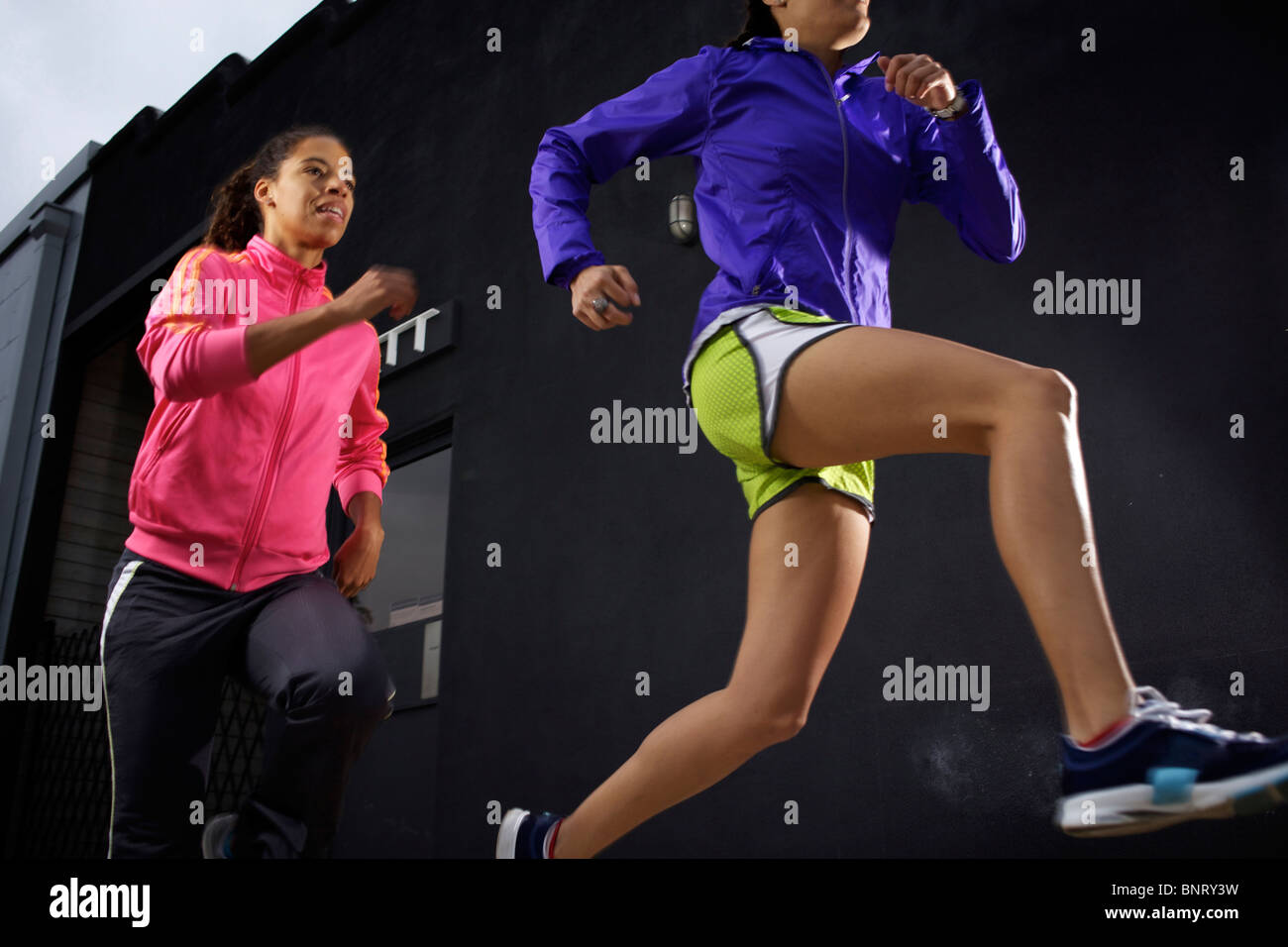 Two female runners being competitive in San Diego Stock Photo - Alamy