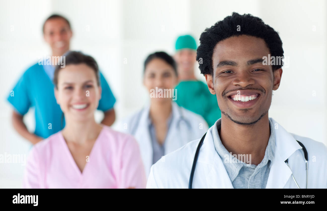 Medical people smiling at the camera Stock Photo - Alamy