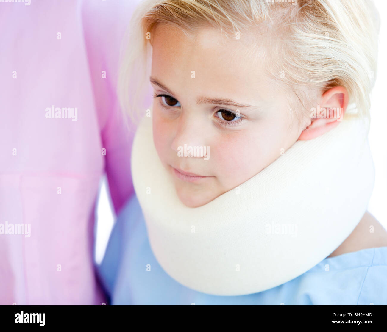 Close-up of a little girl with a neck brace Stock Photo - Alamy