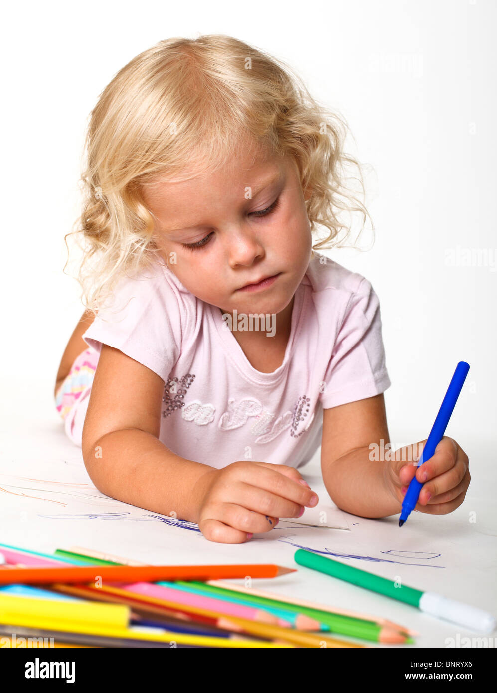 fine portrait of blonde kid drawing Stock Photo - Alamy