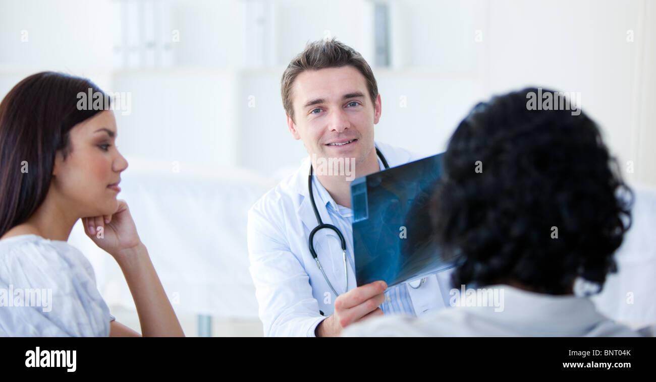 Medical partners explainng the results to the patient Stock Photo - Alamy