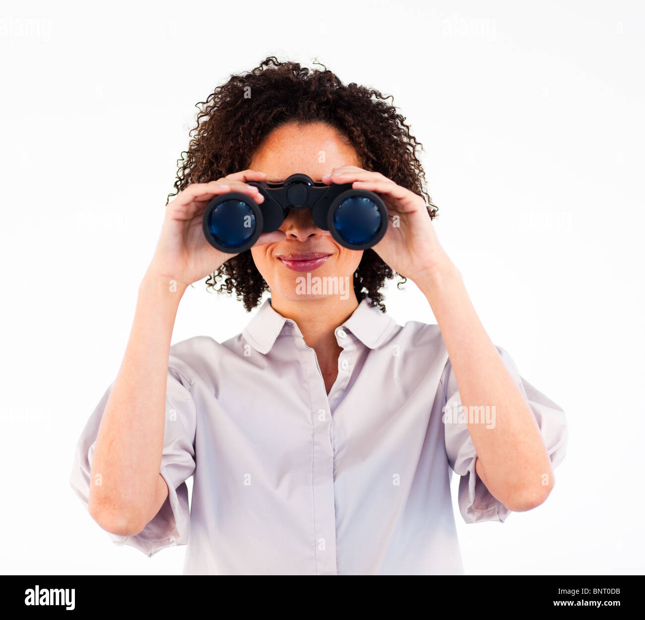 Young businesswoman searching for something with binoculars Stock Photo ...