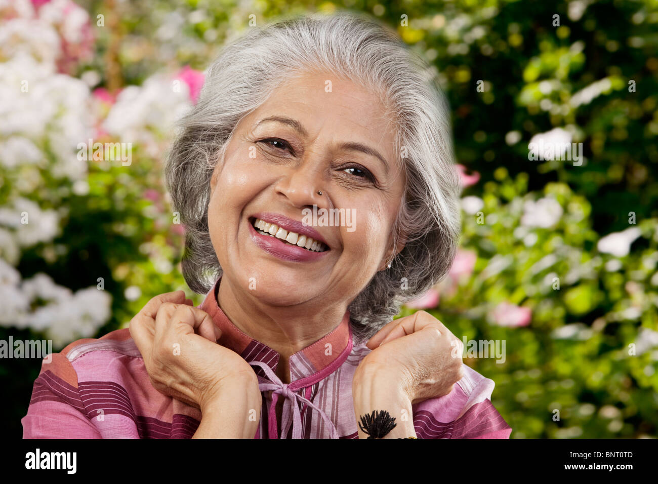 Portrait of an old woman smiling Stock Photo - Alamy