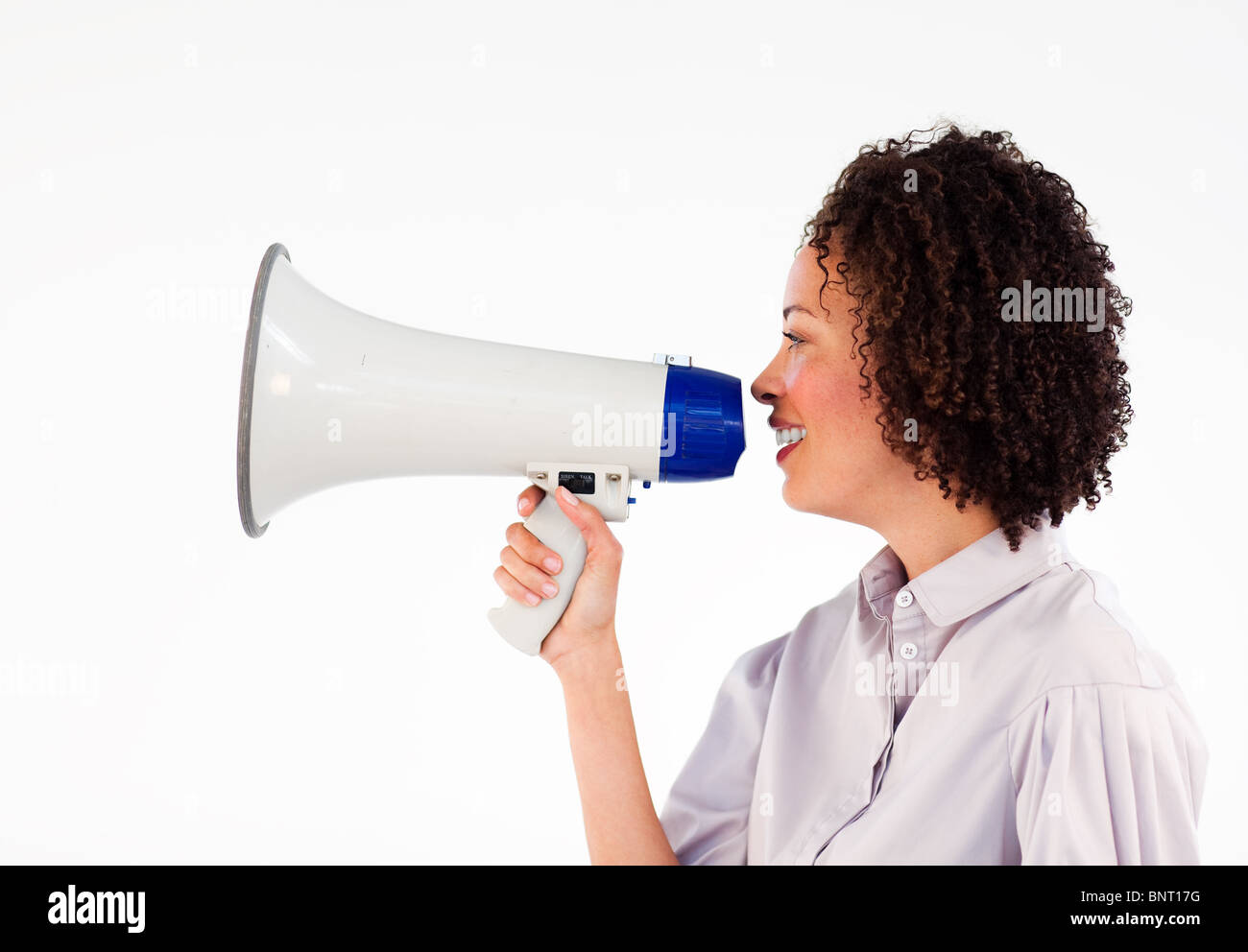 Businesswoman speaking through megaphone Stock Photo - Alamy
