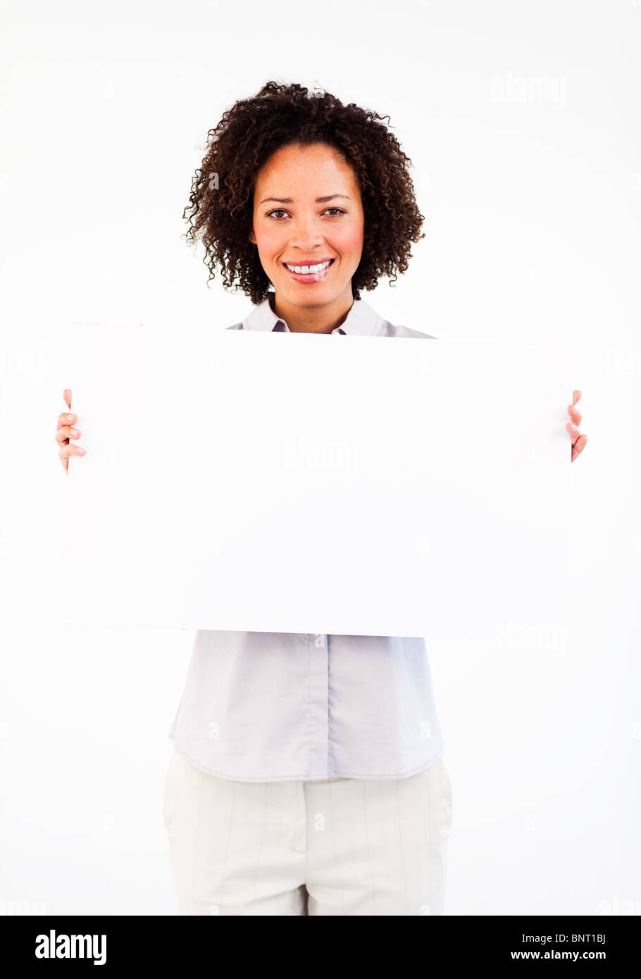 Young businesswoman showing big white card Stock Photo - Alamy
