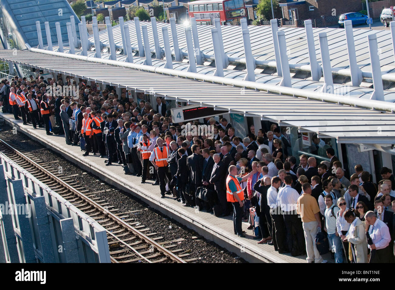 Crowds wait on the DLR platform after an Exhibition, at the ExCel ...