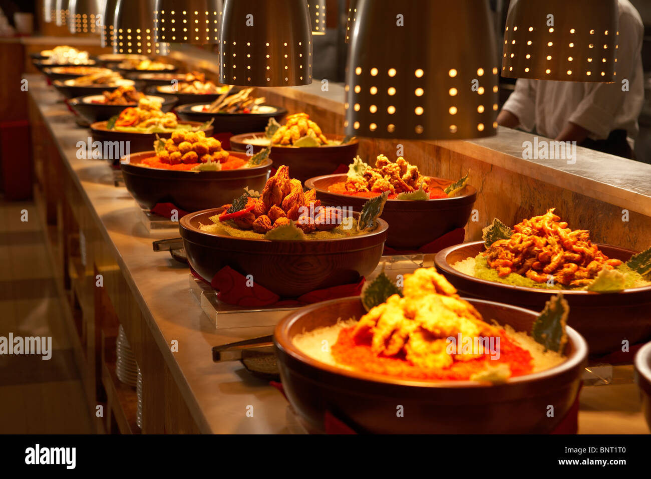 line of dishes on table Stock Photo - Alamy