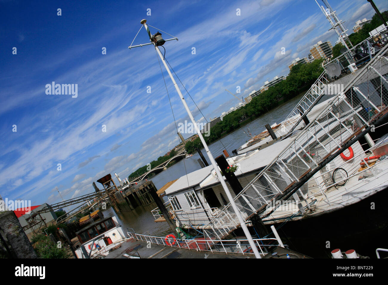 Barge moored at the Tideway Village between Vauxhall and Battersea ...