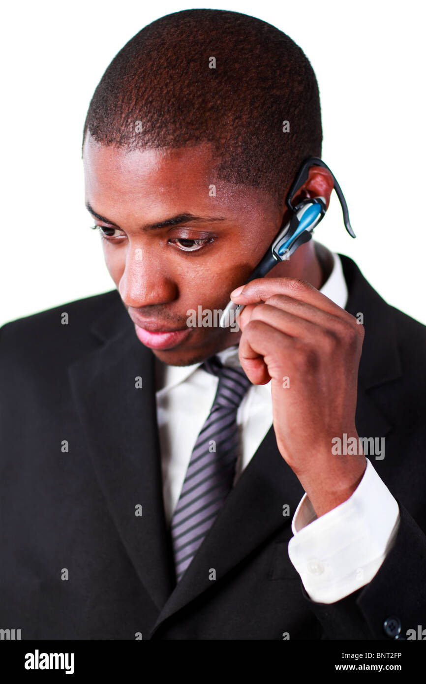 Businessman wearing an earpiece Stock Photo - Alamy