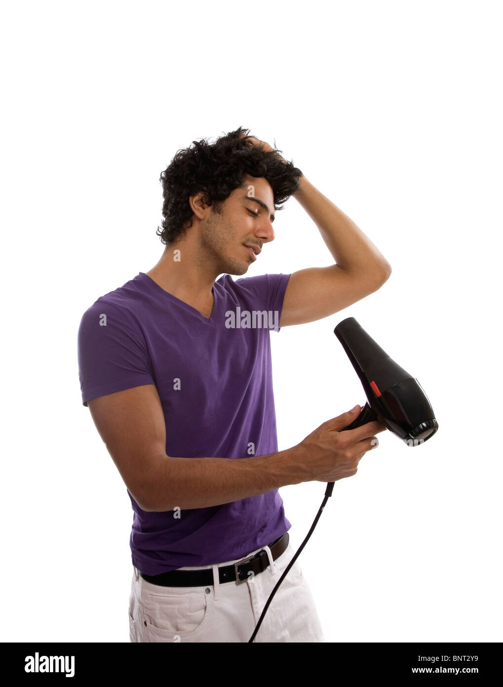 Man blowdrying hair hi-res stock photography and images - Alamy