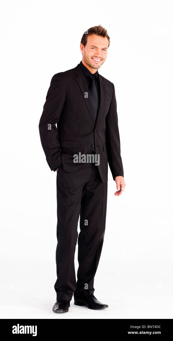 Smiling businessman standing in front of the camera Stock Photo - Alamy