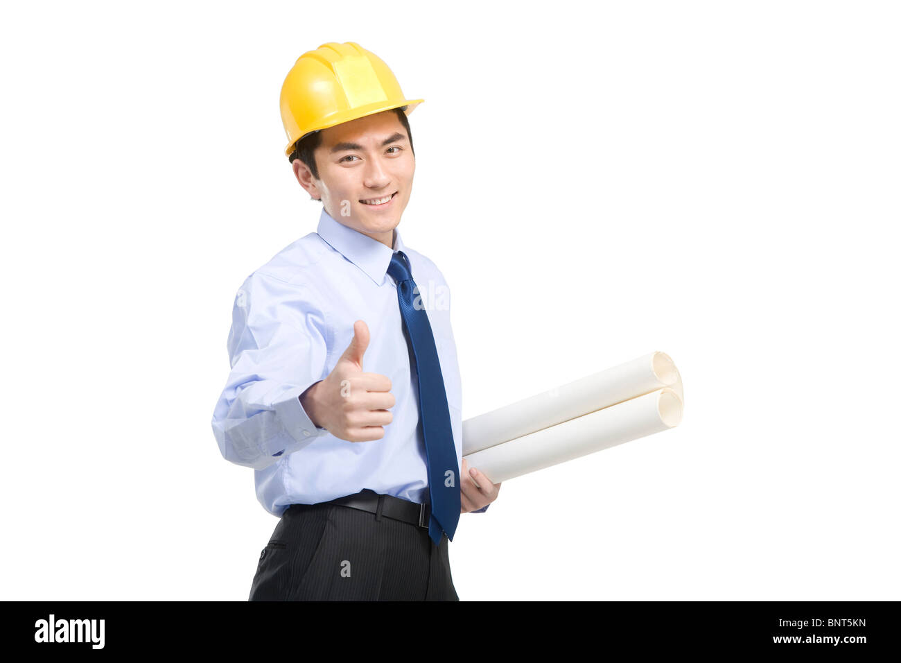 Construction management holding blueprints Stock Photo - Alamy