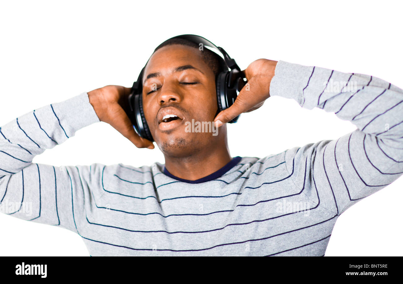 young adult listening to music Stock Photo - Alamy