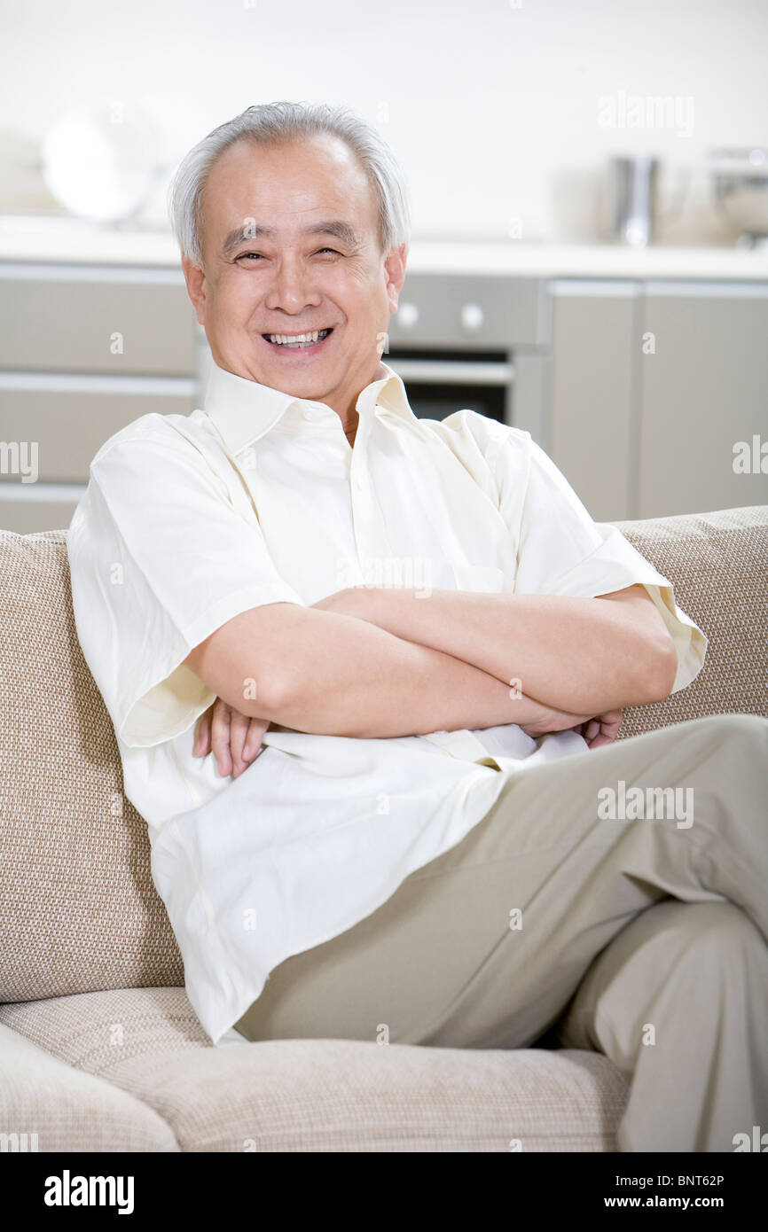Portrait of a senior man at home Stock Photo - Alamy