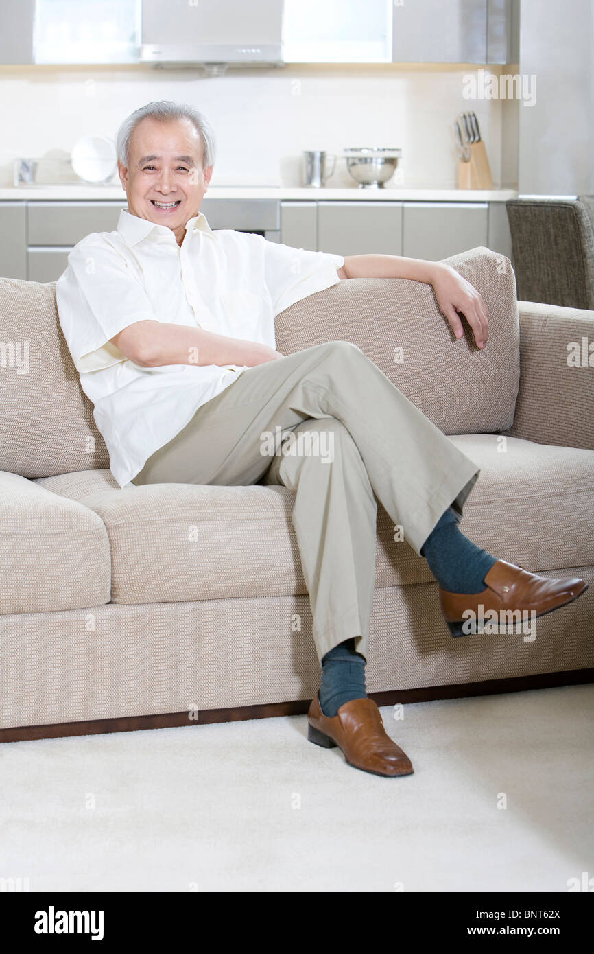 Portrait of a senior man at home Stock Photo - Alamy
