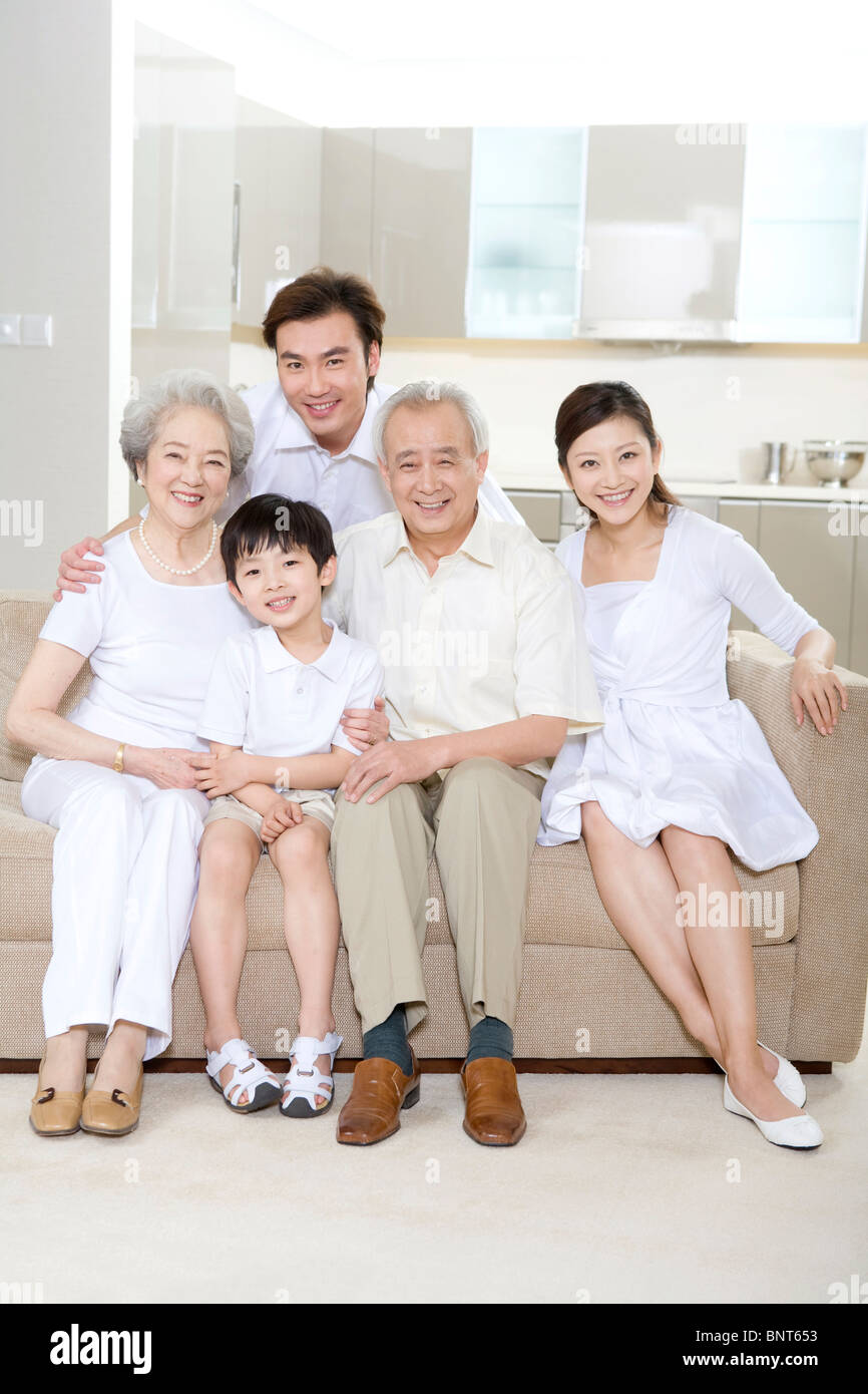 Portrait of a three generation family at home Stock Photo - Alamy