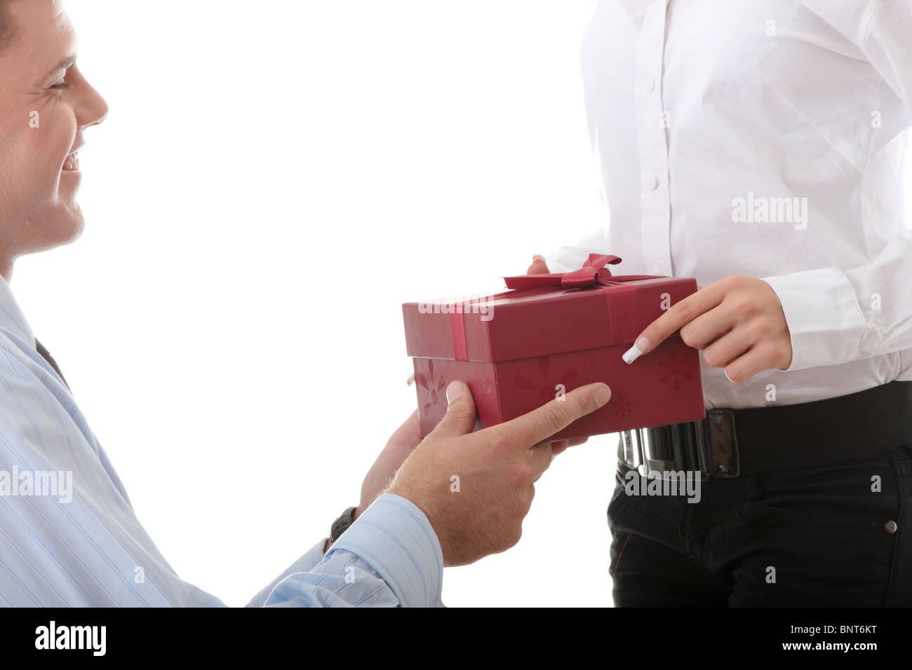 Business man offering a gift to a woman, isolated on white Stock Photo ...