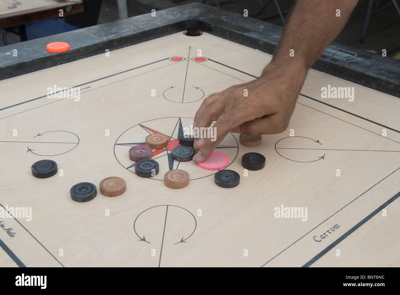 Carrom playing hi-res stock photography and images - Alamy