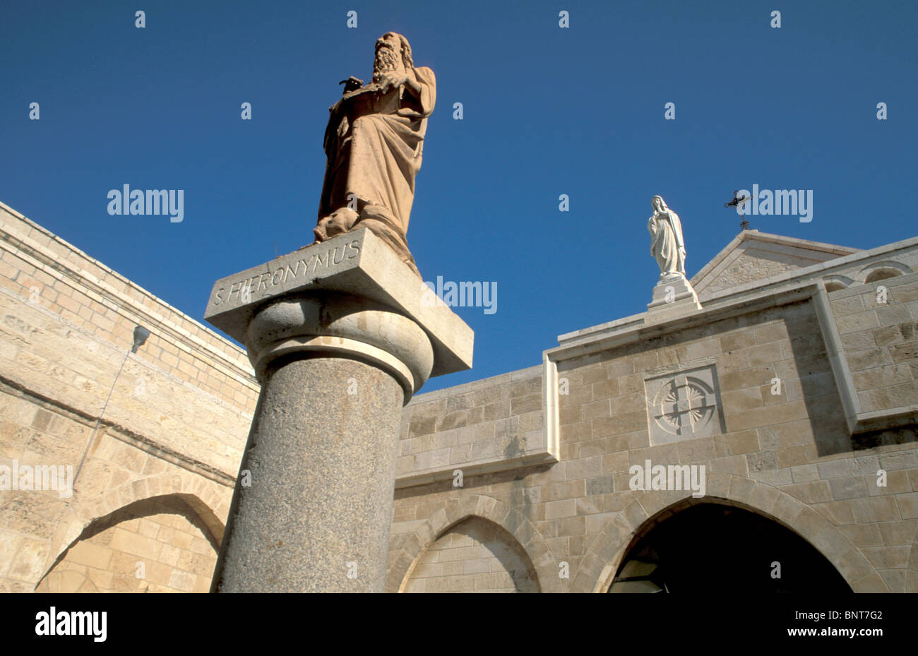 Bethlehem, the statue of St. Jerome in front of Church of St. Catherine ...