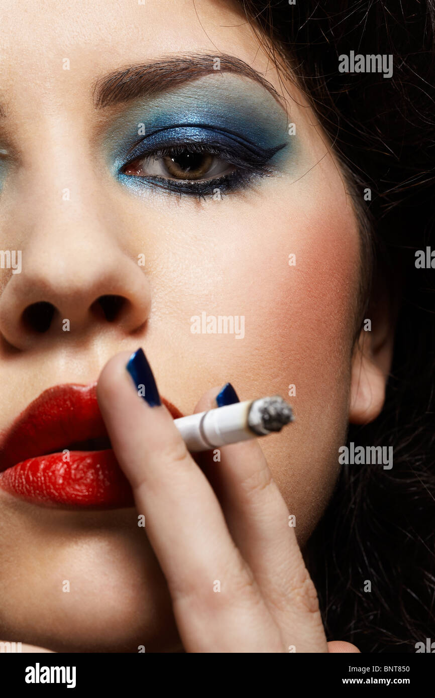 close up portrait of young smoking girl Stock Photo - Alamy