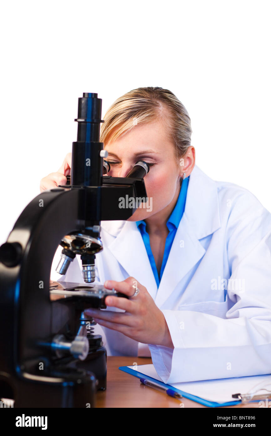 Attractive scientist viewing through microscope Stock Photo - Alamy