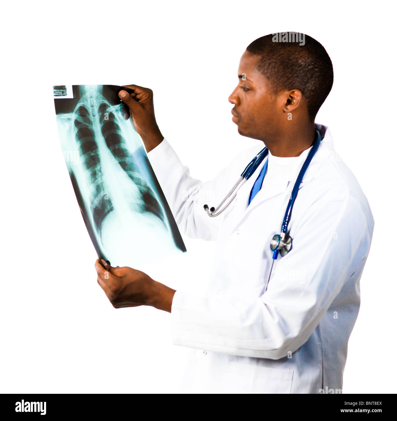 Doctor looking at an x-ray Stock Photo - Alamy