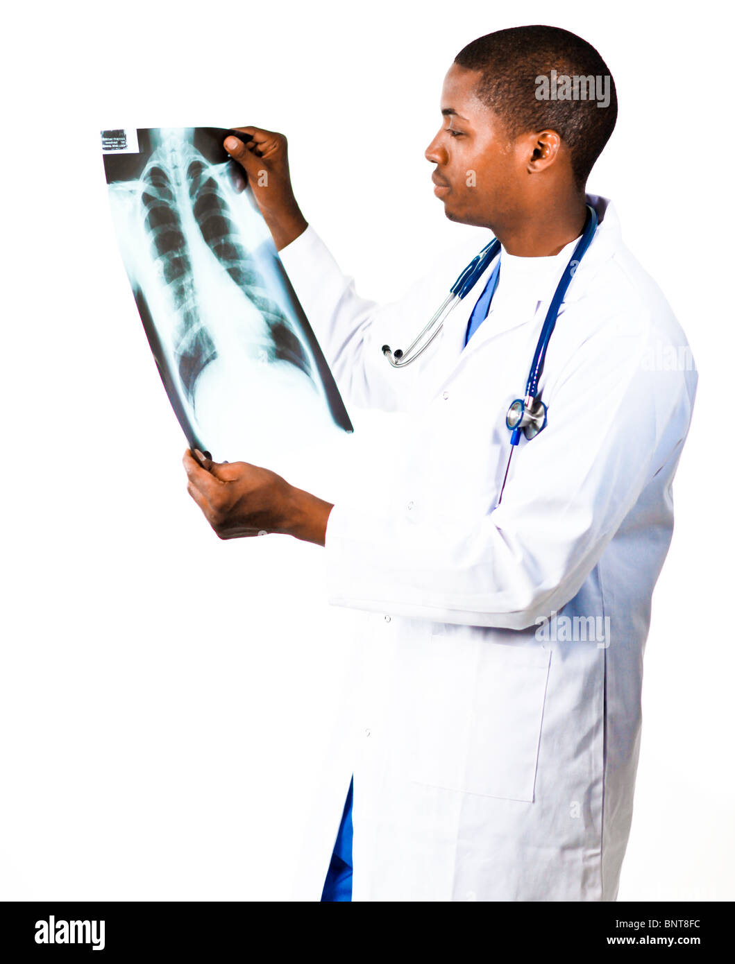 Doctor looking at an x-ray Stock Photo - Alamy