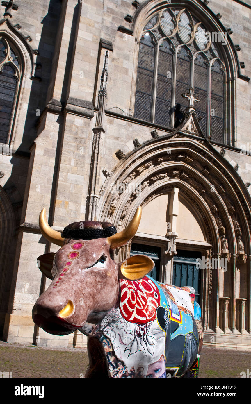 Painted sculpture of a cow, part of the Cow Parade event in front of ...