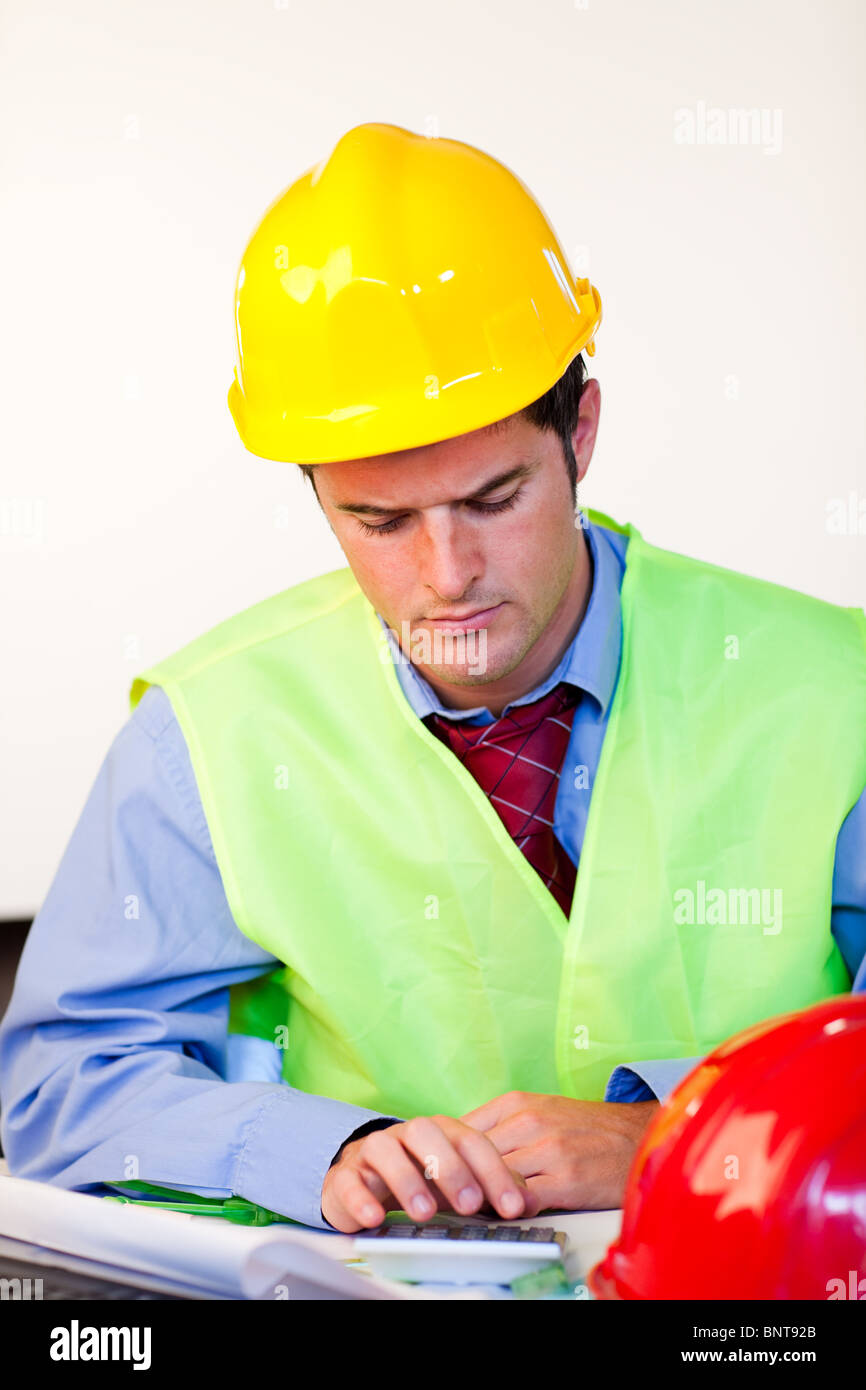 Young man focussing on drawing Stock Photo - Alamy