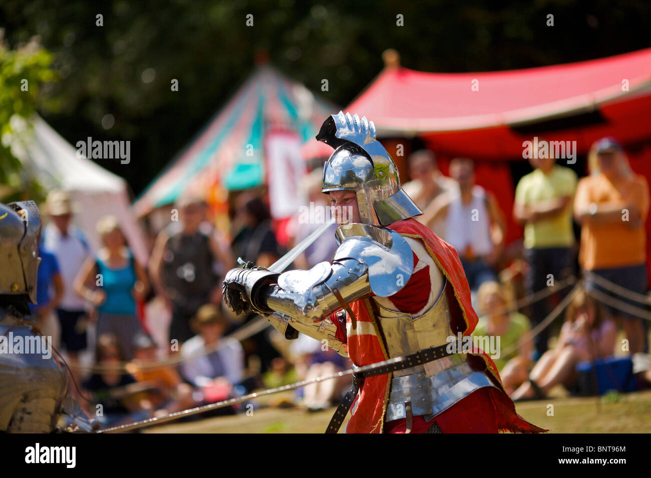 Dressed as medieval knights fight hi-res stock photography and images ...