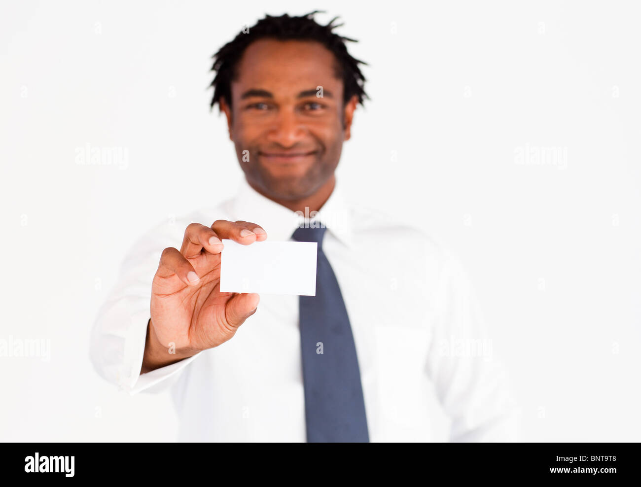Friendly businessman showing his card Stock Photo - Alamy