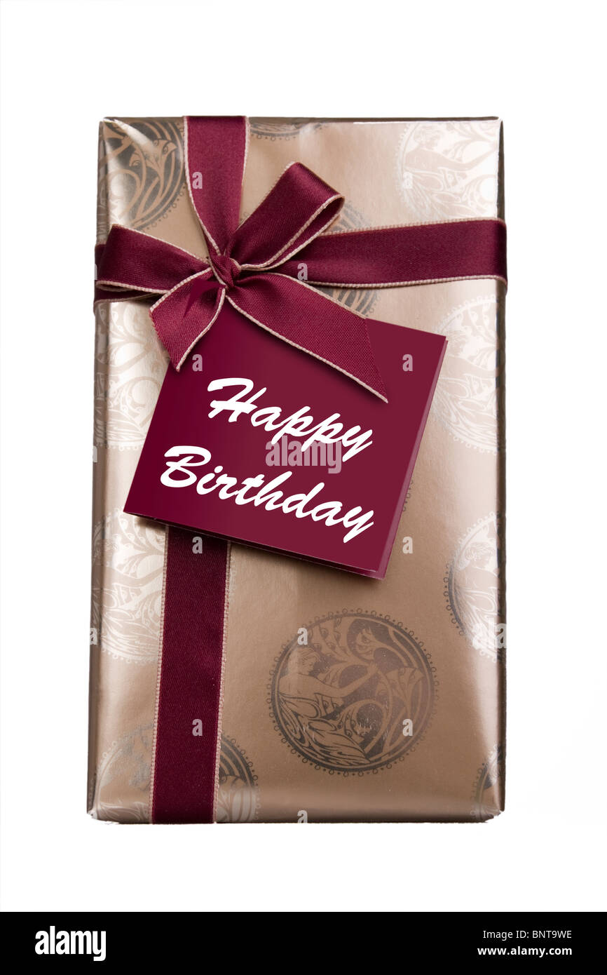 Gift wrapped present with "Happy Birthday" on the card Stock Photo - Alamy
