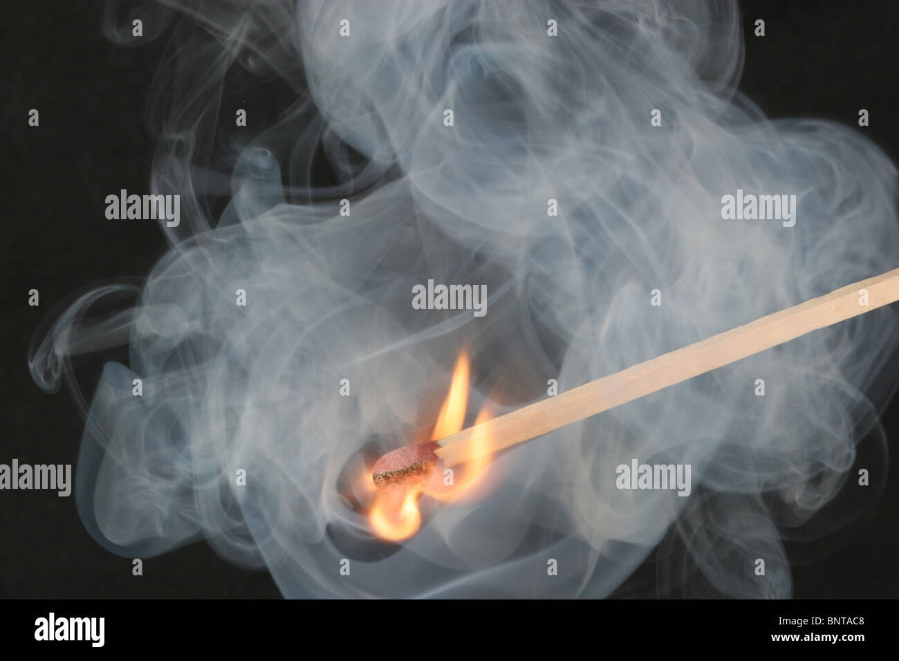 A burning match Stock Photo - Alamy