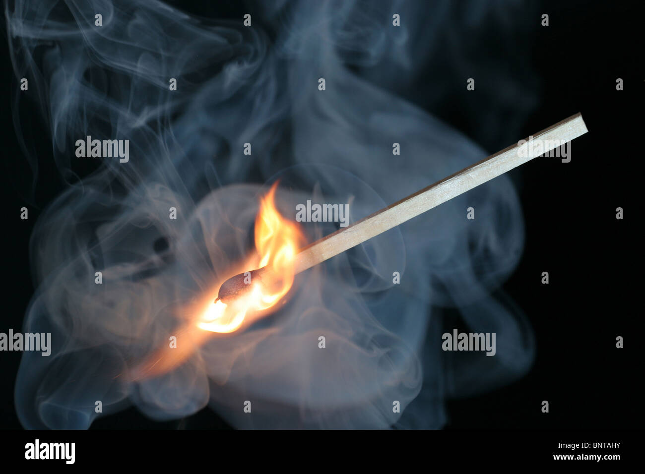 A burning match Stock Photo - Alamy