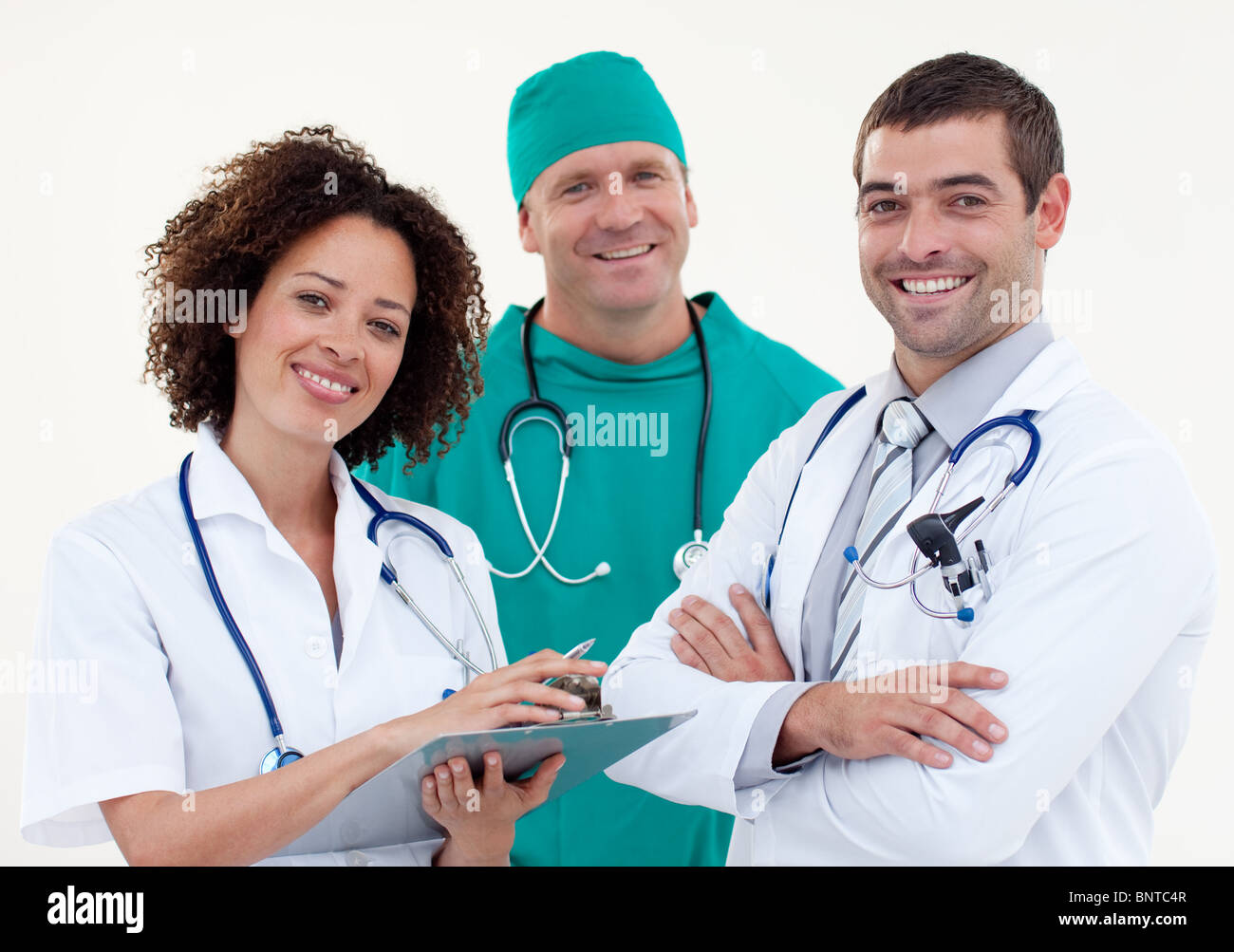 Smiling doctors looking at the camera Stock Photo - Alamy